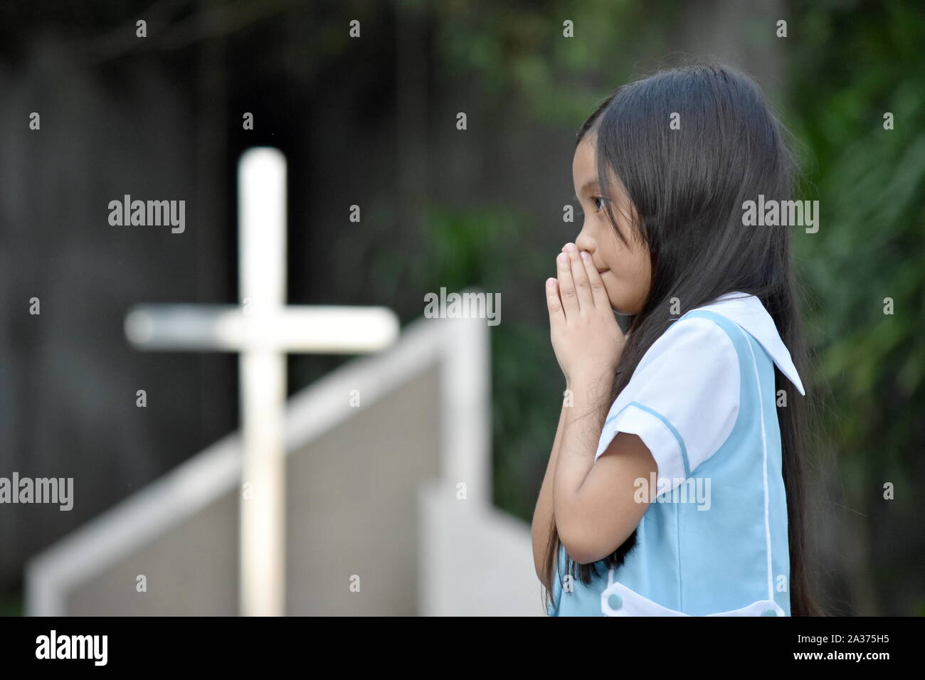 Filipino girl prayer hi-res stock photography and images - Alamy