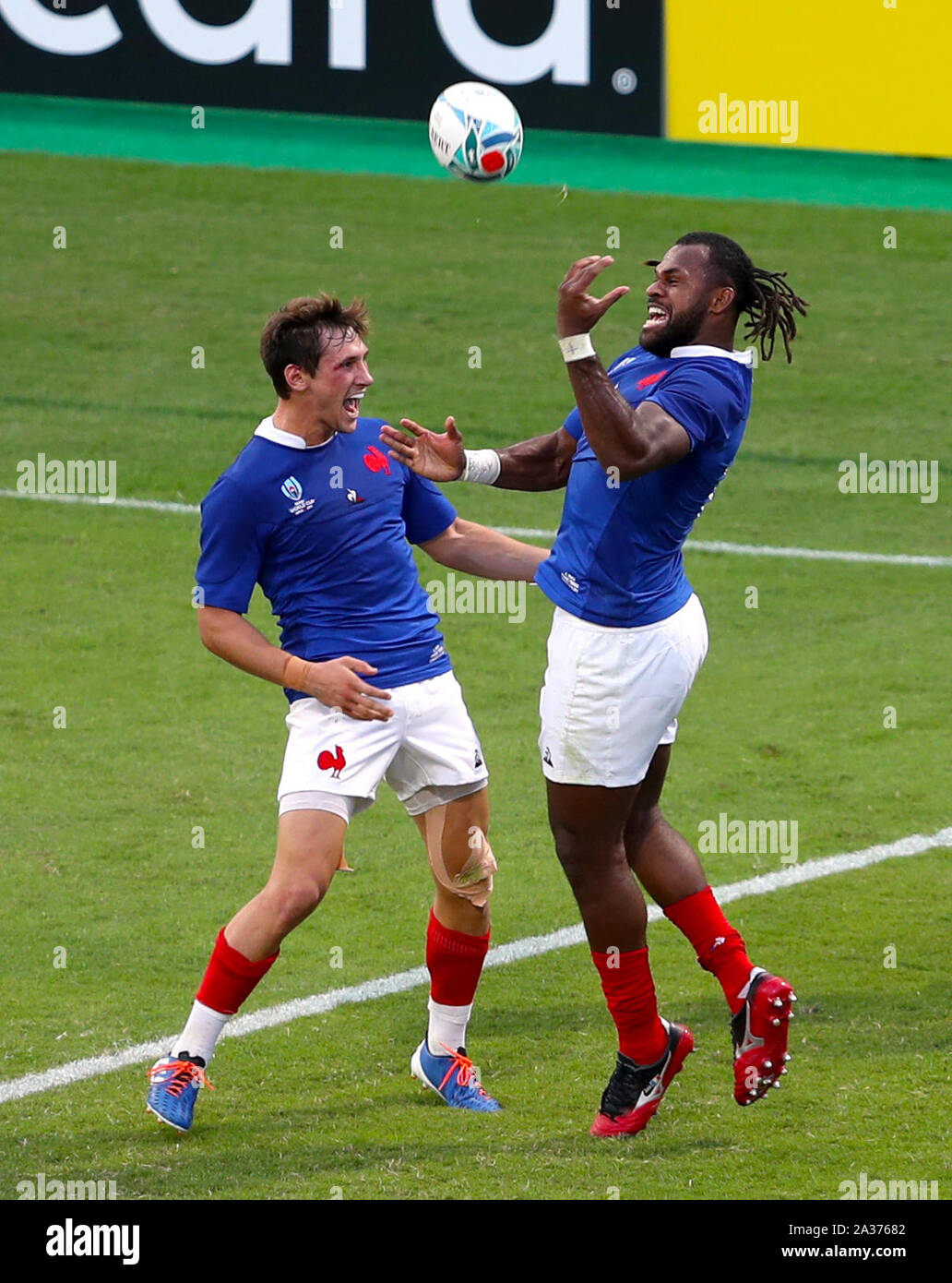 France's Alivereti Raka (right) celebrates scoring his sides second try ...