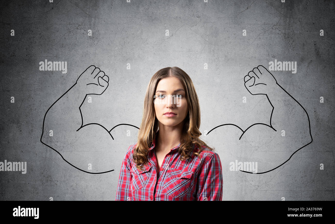 Young woman having serious and calm face. Caucasian brown haired girl ...