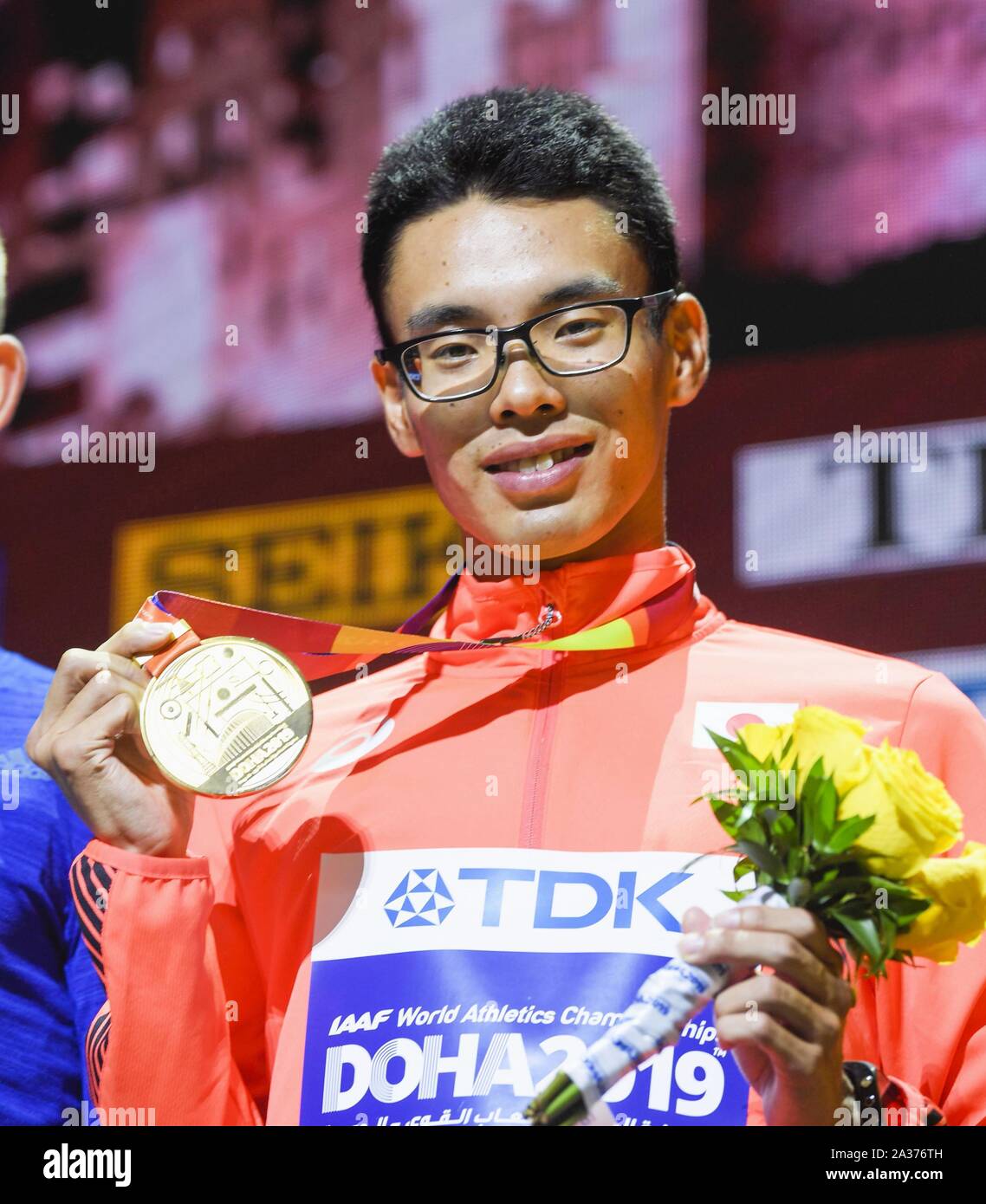 Japan's Toshikazu Yamanishi poses with his gold medal during the award ...