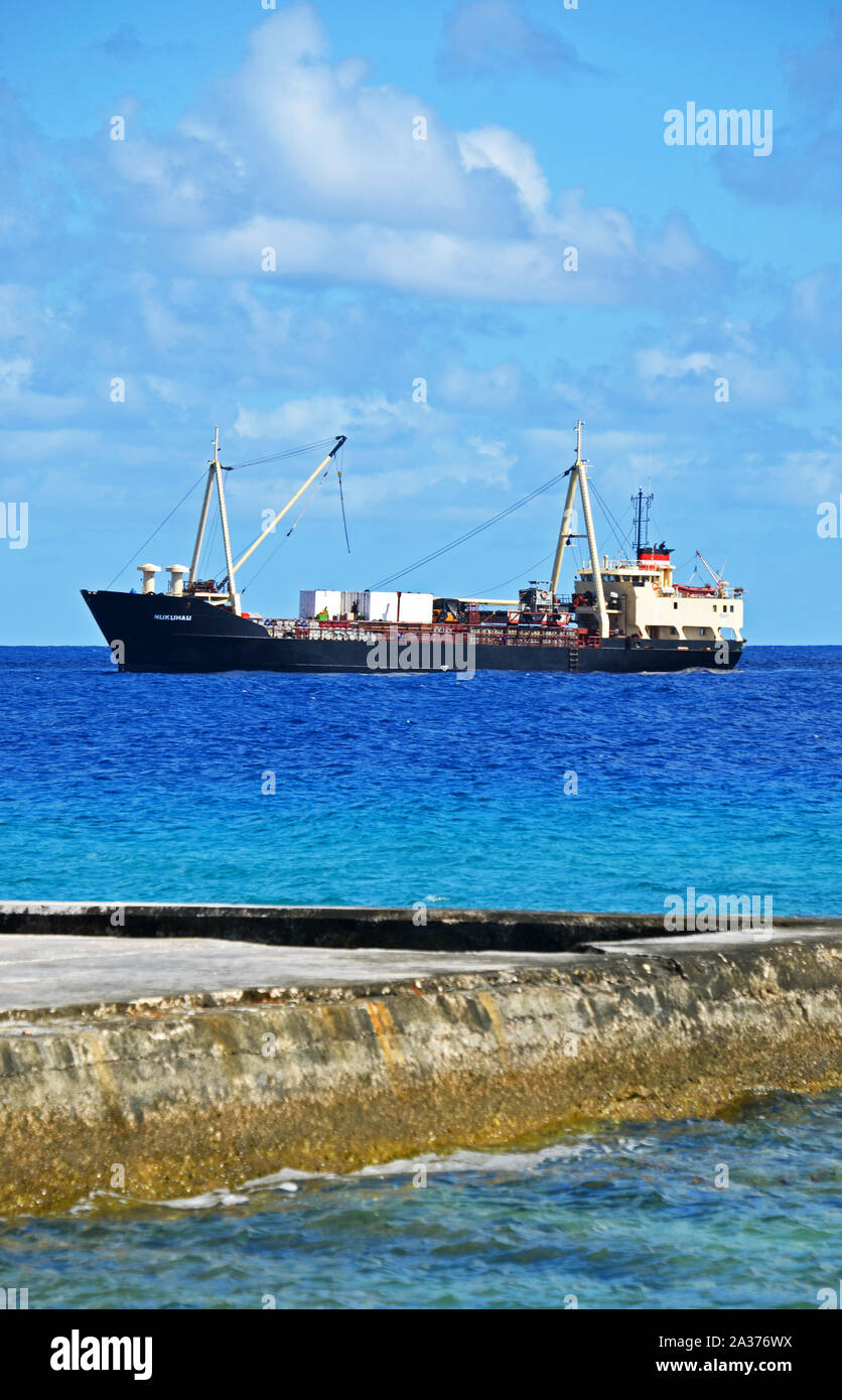 Cargo ship moored off the port on Anaa Atoll, French Polynesia Stock ...