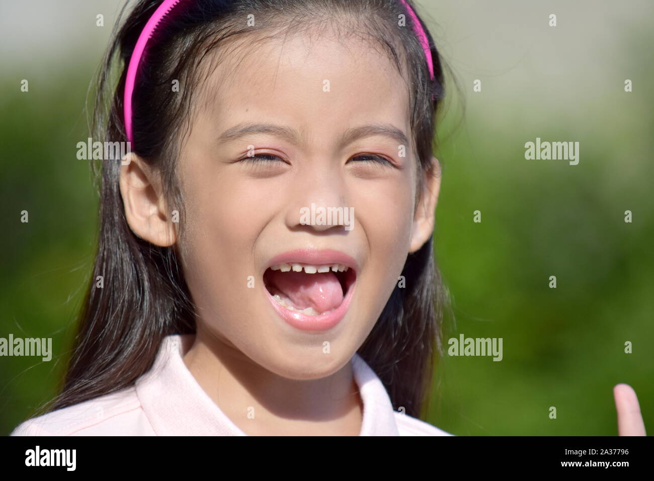 Making faces childhood hi-res stock photography and images - Alamy