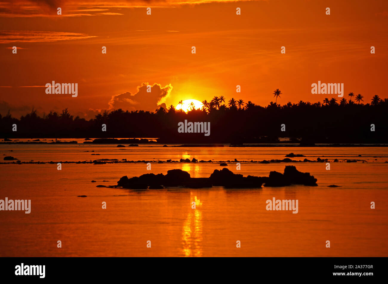 Sunset over the lagoon, Anaa Atoll, French Polynesia Stock Photo - Alamy
