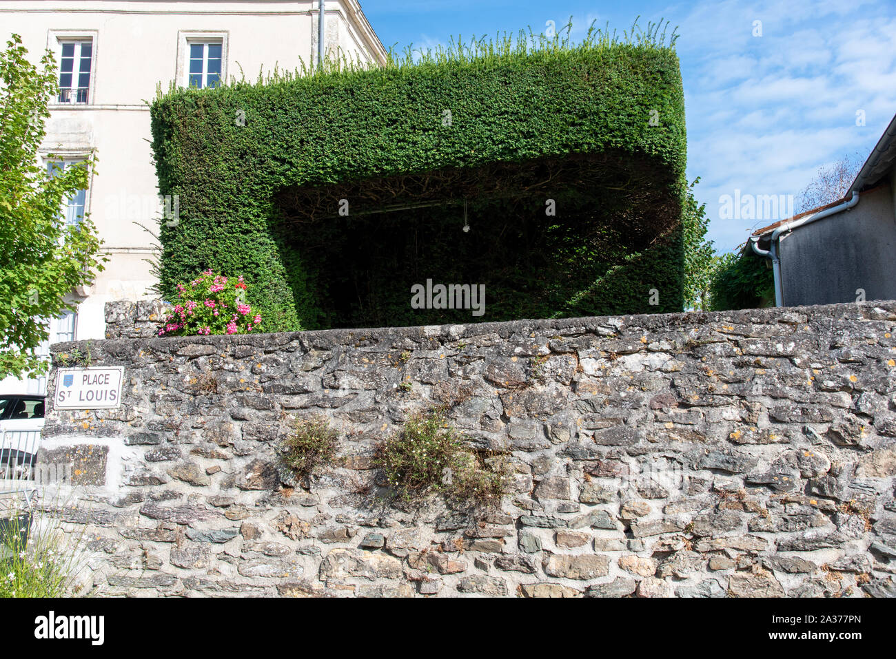 The medieval small city of Vouvant in the Vendee region of France Stock ...