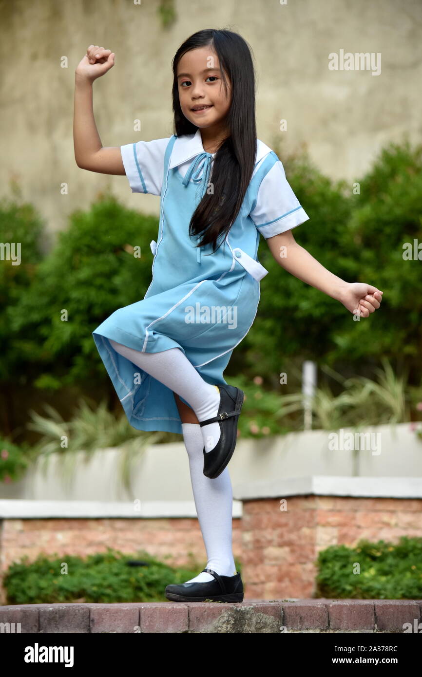 A Pretty Minority Girl Student Dancing Stock Photo - Alamy