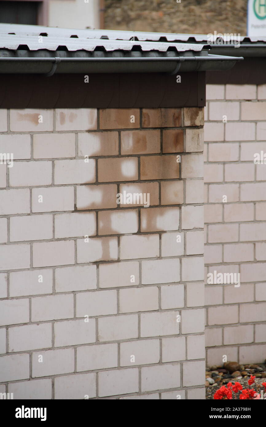 Water damage on a wet stone wall Stock Photo - Alamy