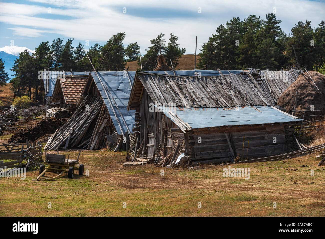 Old wooden barns high in the mountain Stock Photo - Alamy