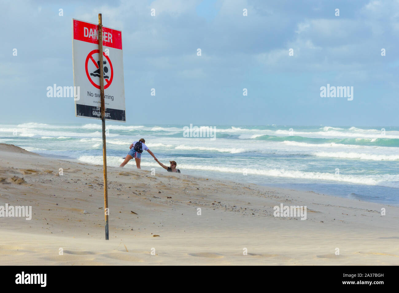 The normally-crowded and popular Surfers Paradise beach in Queensland ...