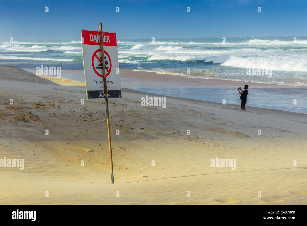 The normally-crowded and popular Surfers Paradise beach in Queensland ...