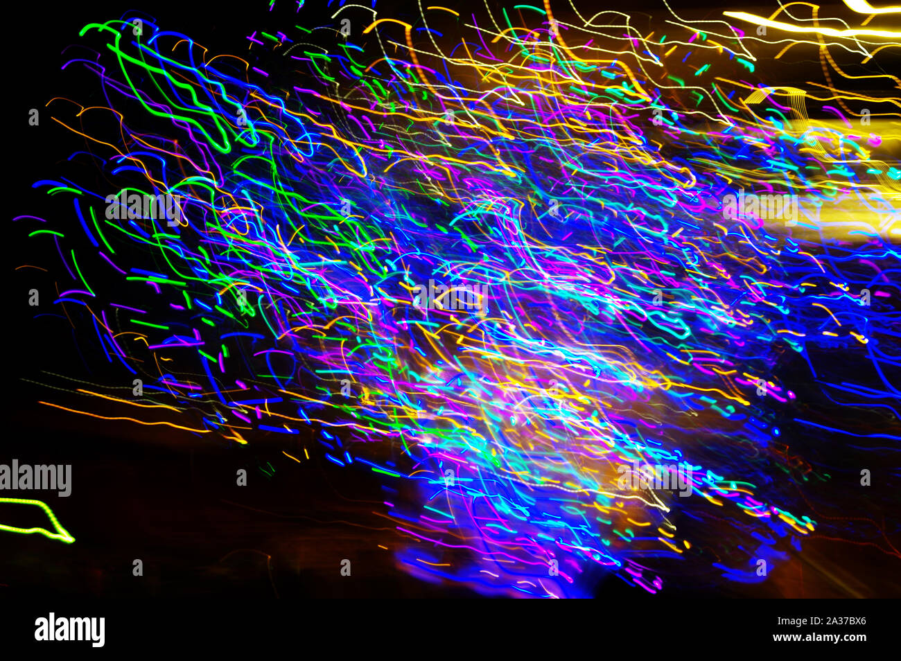 Abstract lights lines. Hundreds moving color points on dark background ...