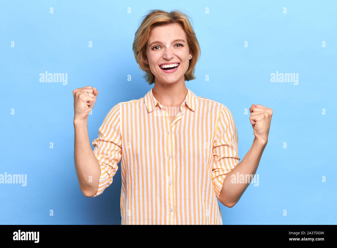 winning successful young girl rejoicing her victory, success. Positive ...