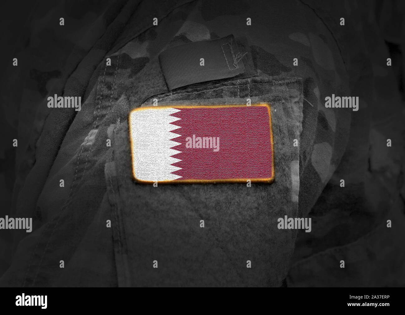 Flag of Qatar on military uniform (collage Stock Photo - Alamy