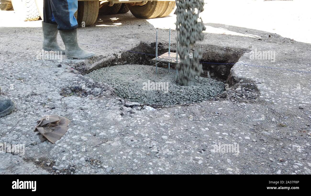 Pouring concrete mix on concreting hi-res stock photography and images ...