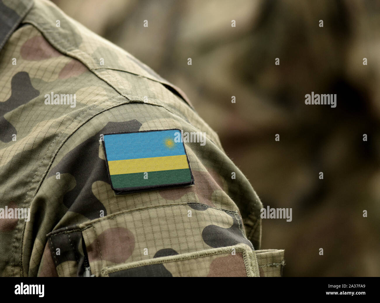 Flag of Rwanda on soldiers arm. Rwanda flag on military uniform. Army ...