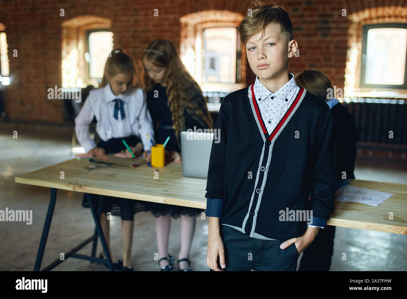 Photo of serious smart boy dressed in fashion stylish clothes with ...