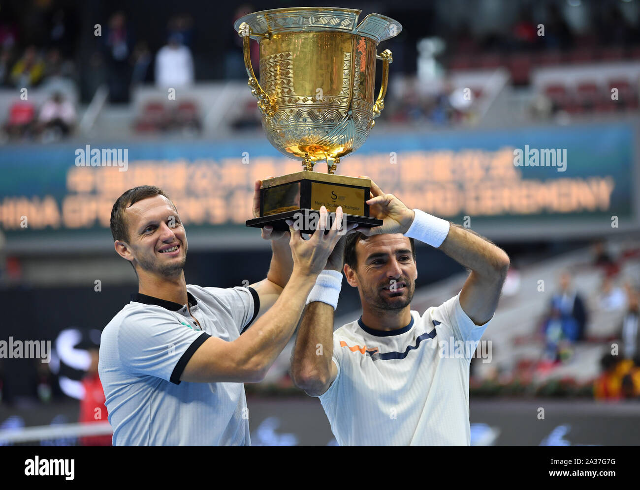 Beijing, China. 6th Oct, 2019. Filip Polasek (L) of Slovakia and Ivan ...