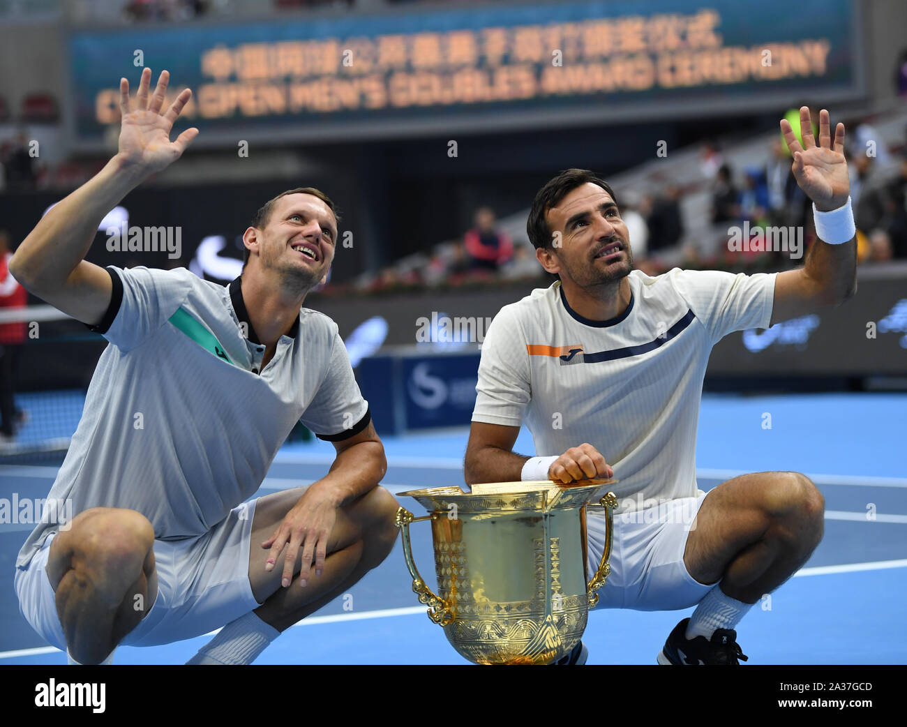 Beijing, China. 6th Oct, 2019. Filip Polasek (L) of Slovakia and Ivan ...