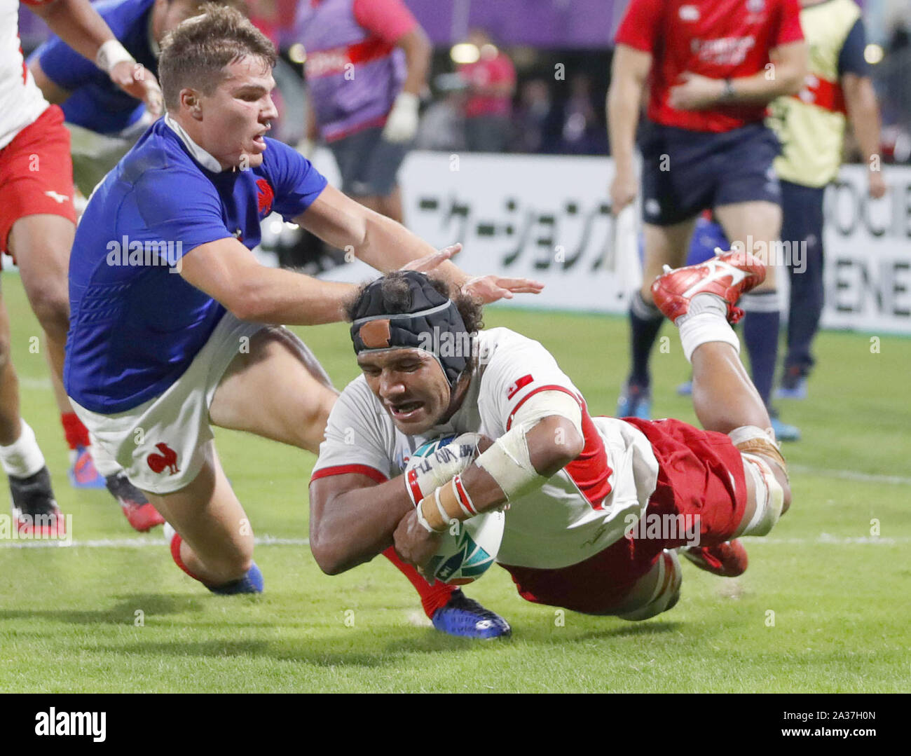 Kumamoto, Japan. 6th Oct, 2019. Zane Kapeli of Tonga scores a try ...