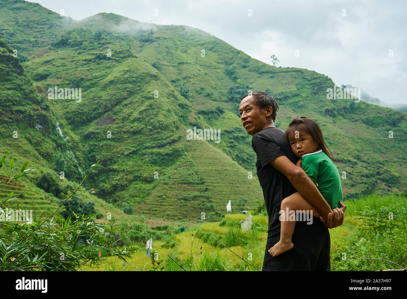 Vietnamese father with kid Stock Photo - Alamy