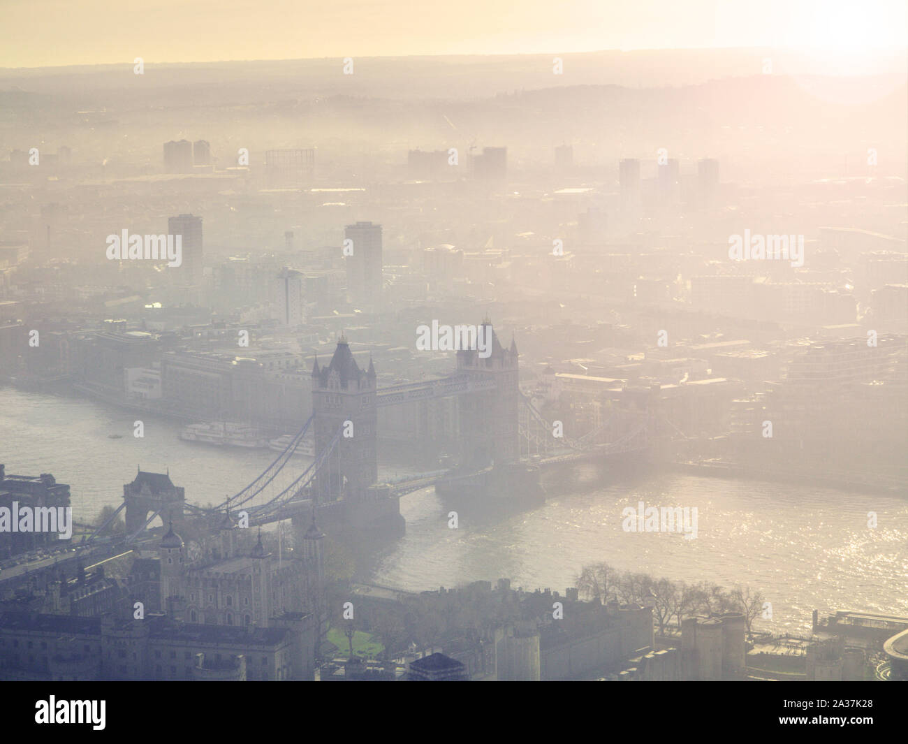 Dramatic shots of Tower Bridge and south London on a smoggy morning ...