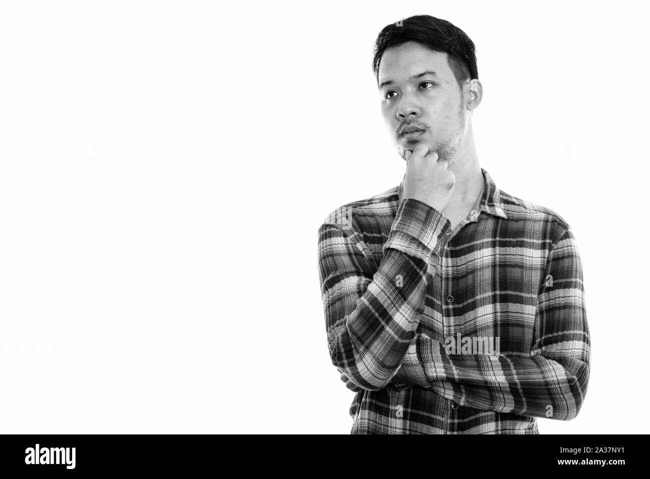 Asian man thinking Cut Out Stock Images & Pictures - Alamy