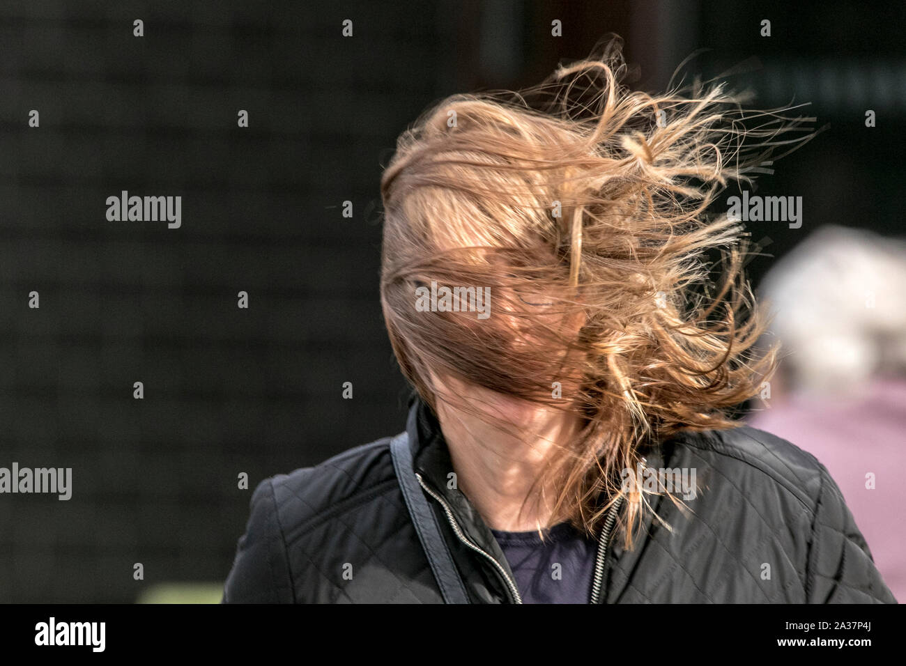 Hair blown in face by wind hi-res stock photography and images - Alamy