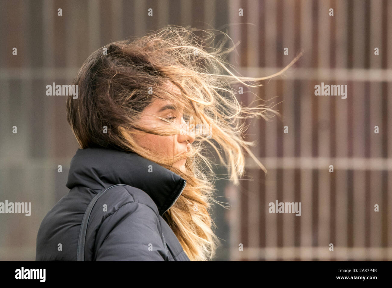 Hair blown in face by wind hi-res stock photography and images - Alamy