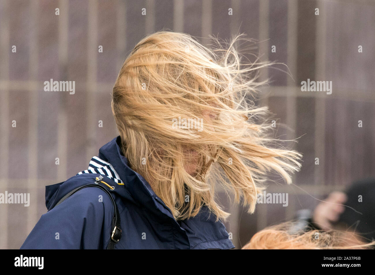 Hair blown in face by wind hi-res stock photography and images - Alamy