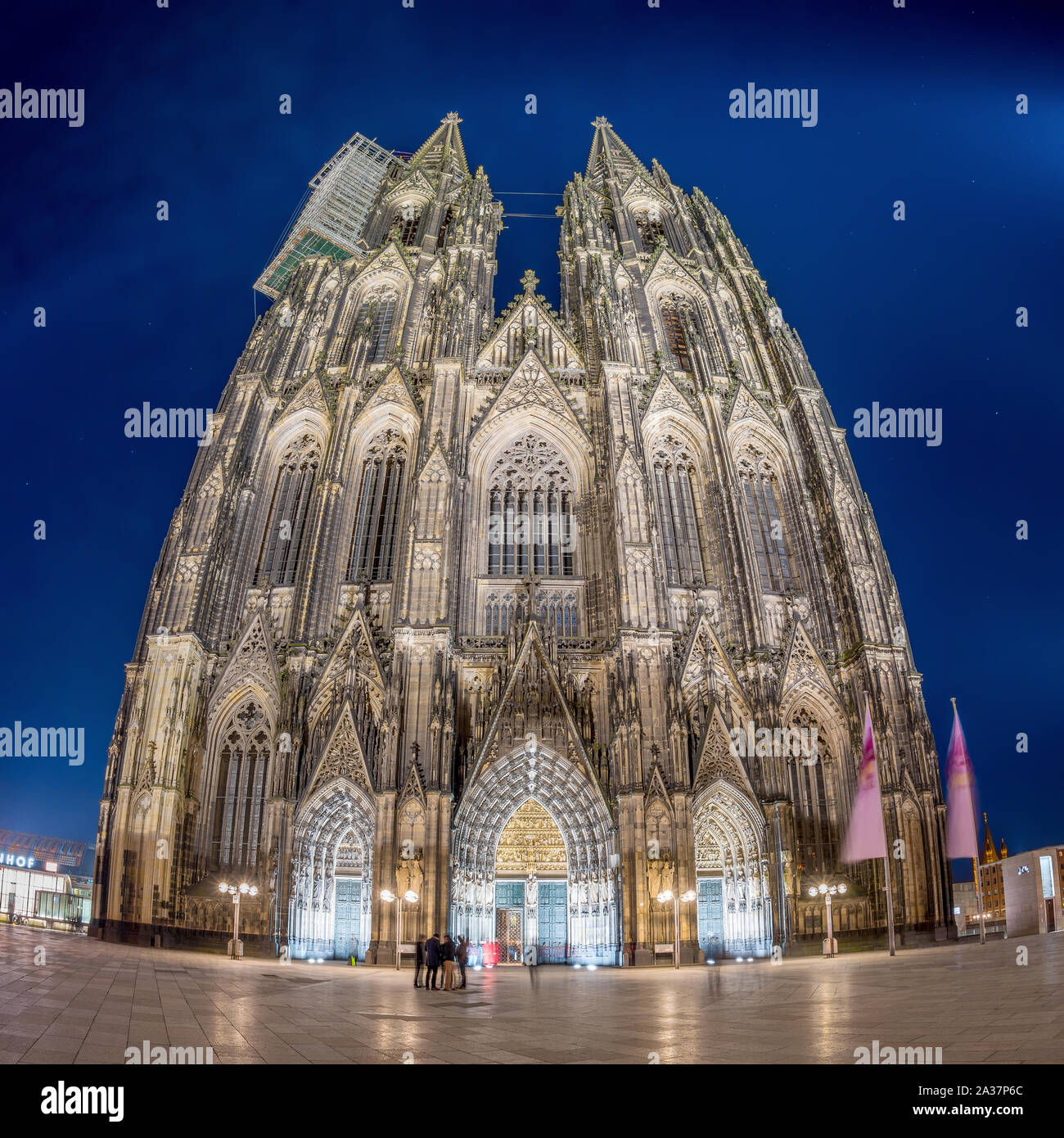 The city of Cologne with its landmark, the Cologne Cathedral at night ...