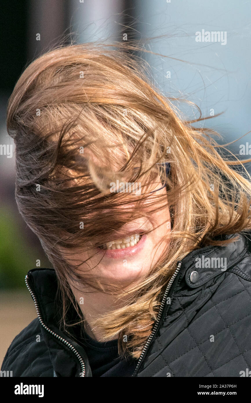 Hair blown in face by wind hi-res stock photography and images - Alamy