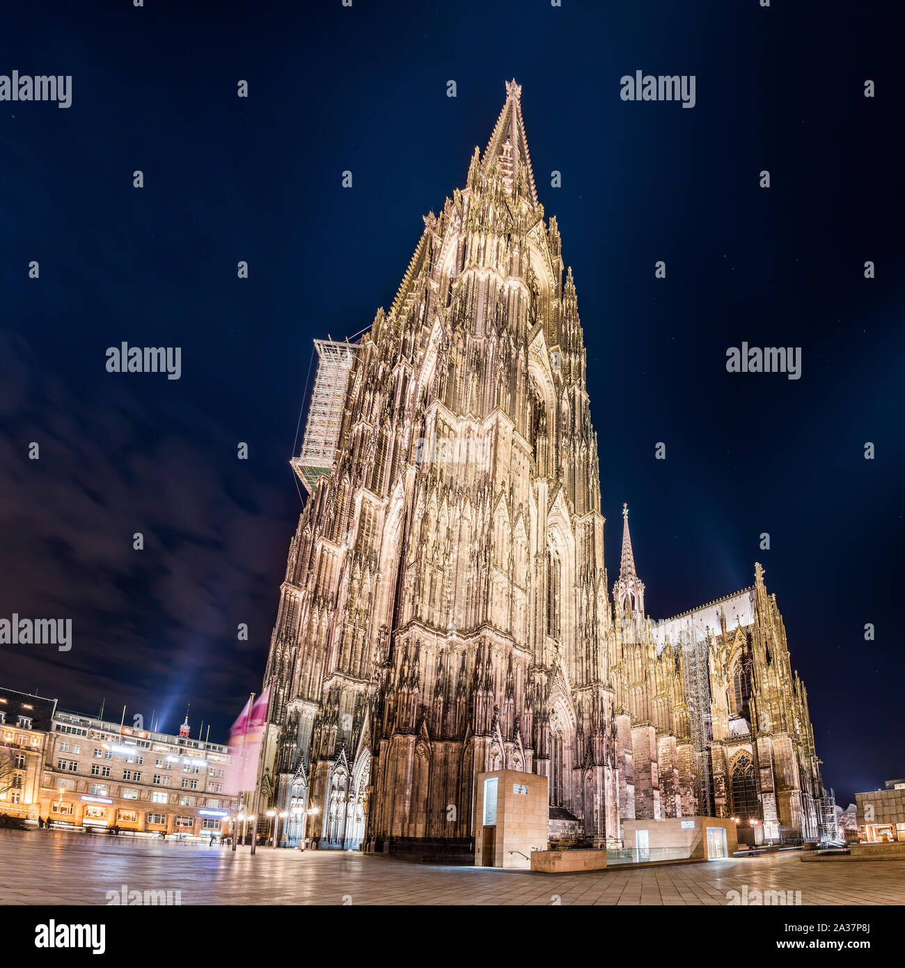 The city of Cologne with its landmark, the Cologne Cathedral at night ...