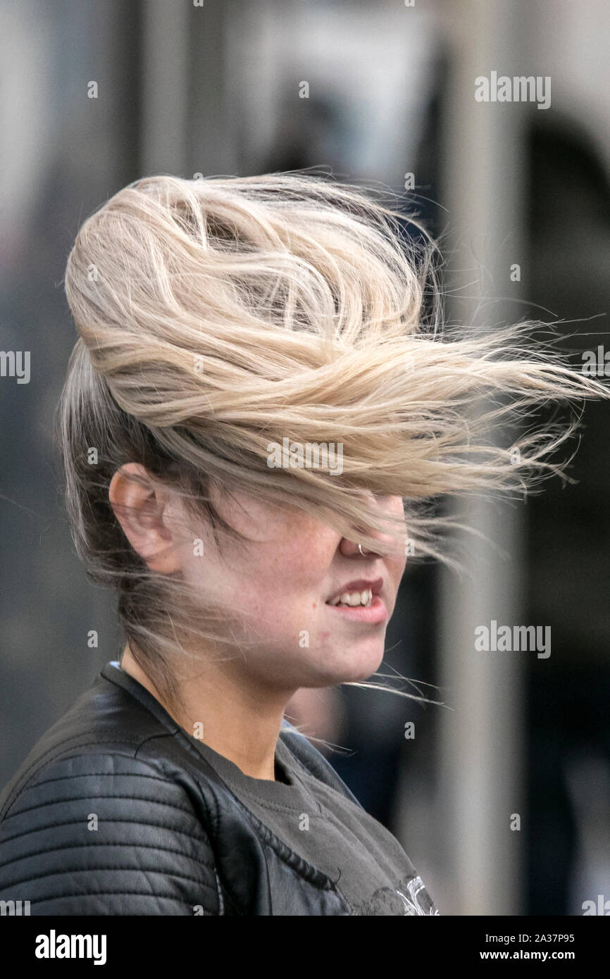 Hair blown in face by wind hi-res stock photography and images - Alamy