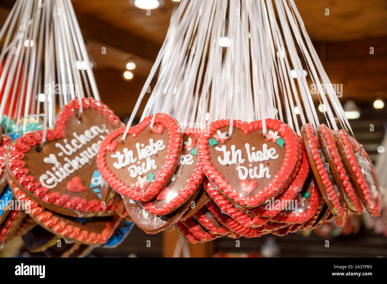 Bunch of traditional Lebkuchenherz gingerbread hearts with "I love you ...