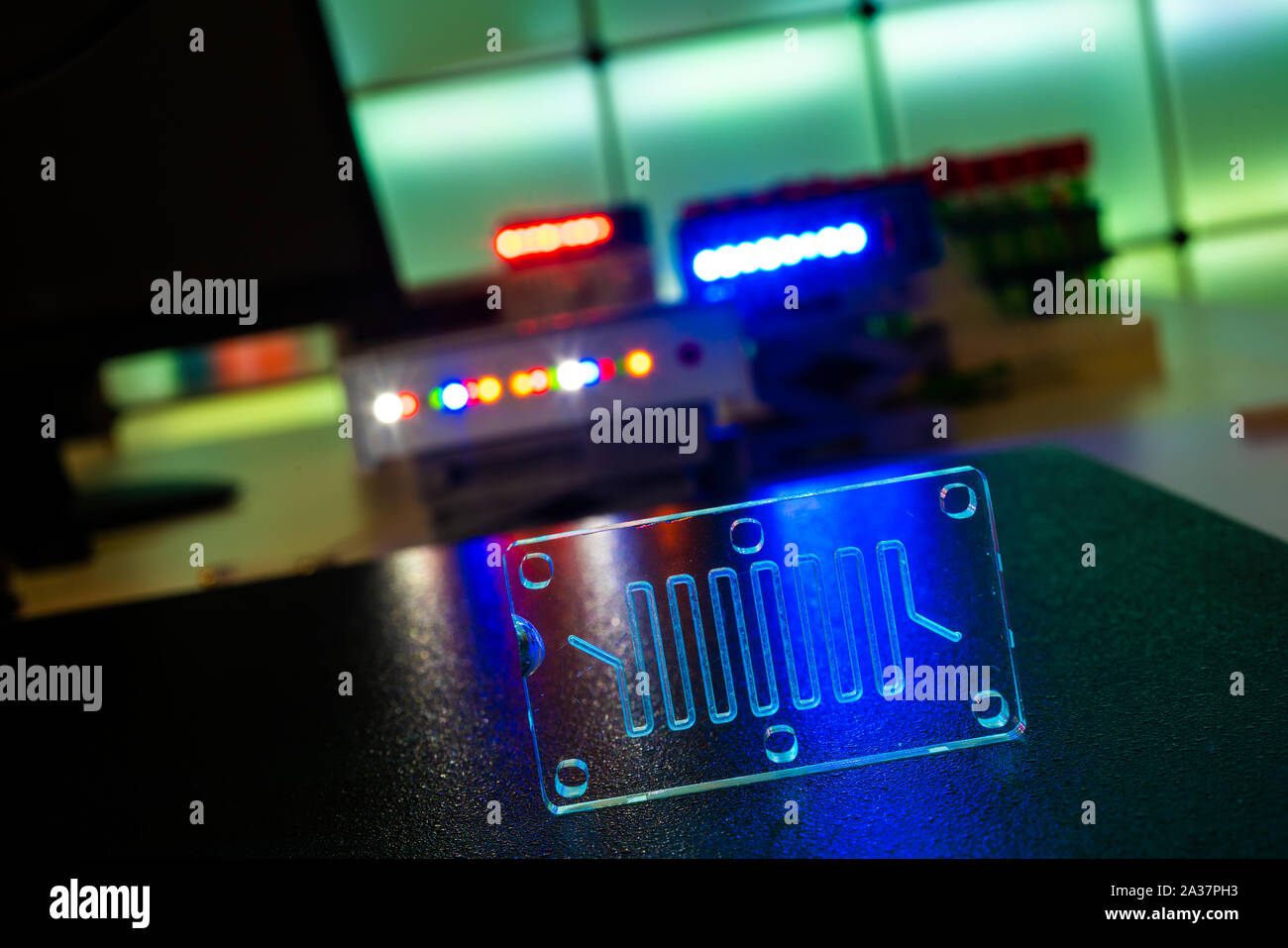 microfluidic device Instrument that uses micro amounts of fluid on a ...