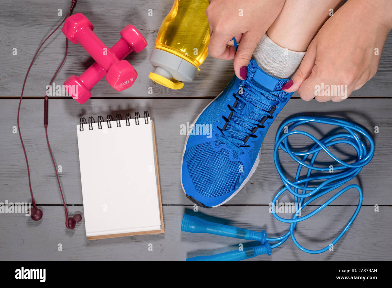 Training exercise list mockup. Blank page notepad, sneakers, jumping ...