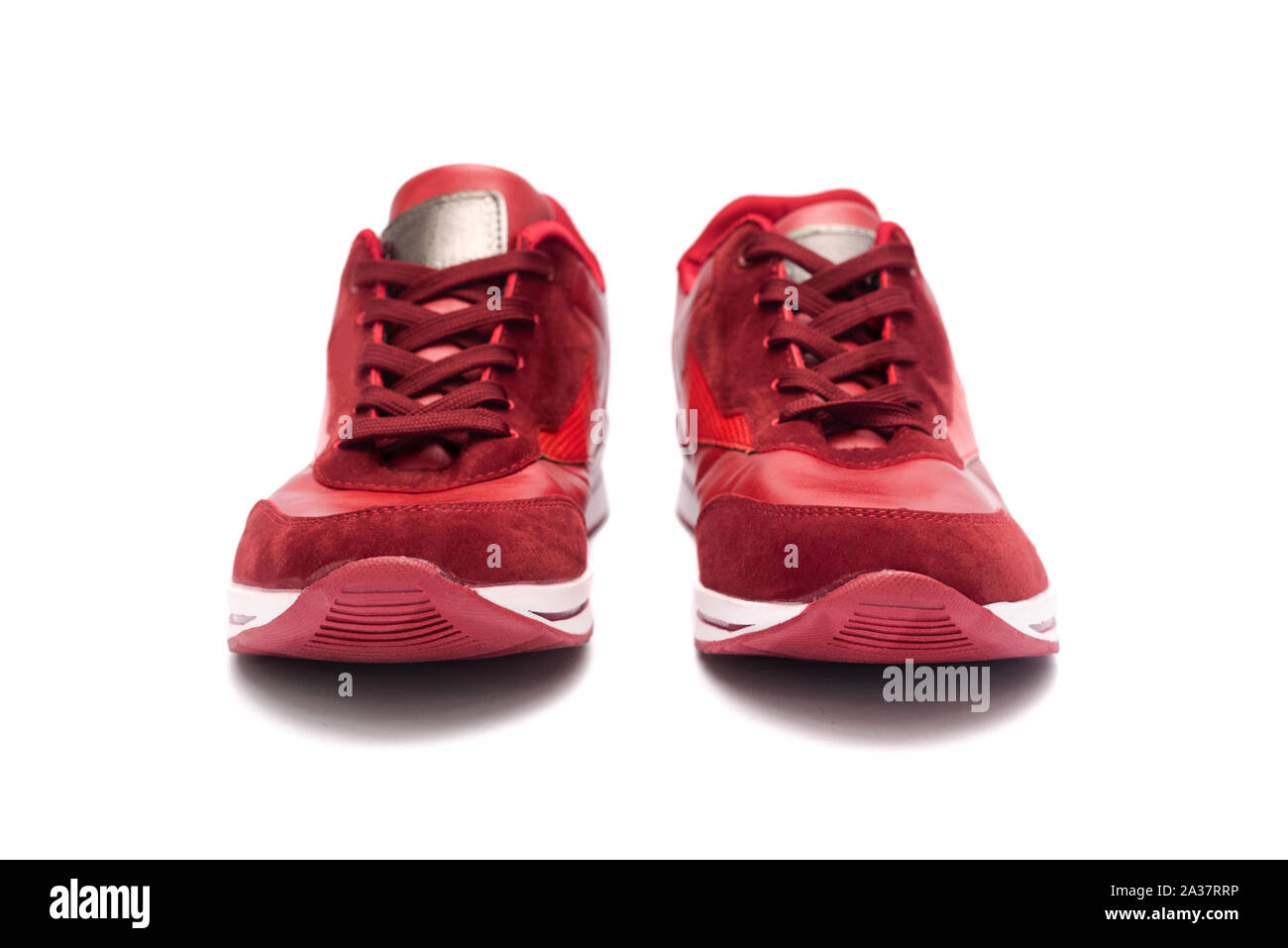 Red sport shoes isolated on white background. Front view Stock Photo ...