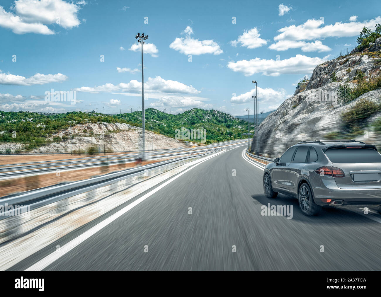 Gray car on the highway Stock Photo - Alamy