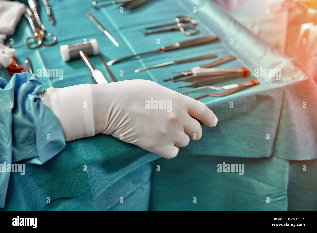 medical instruments with surgeons hand in operation room Stock Photo ...