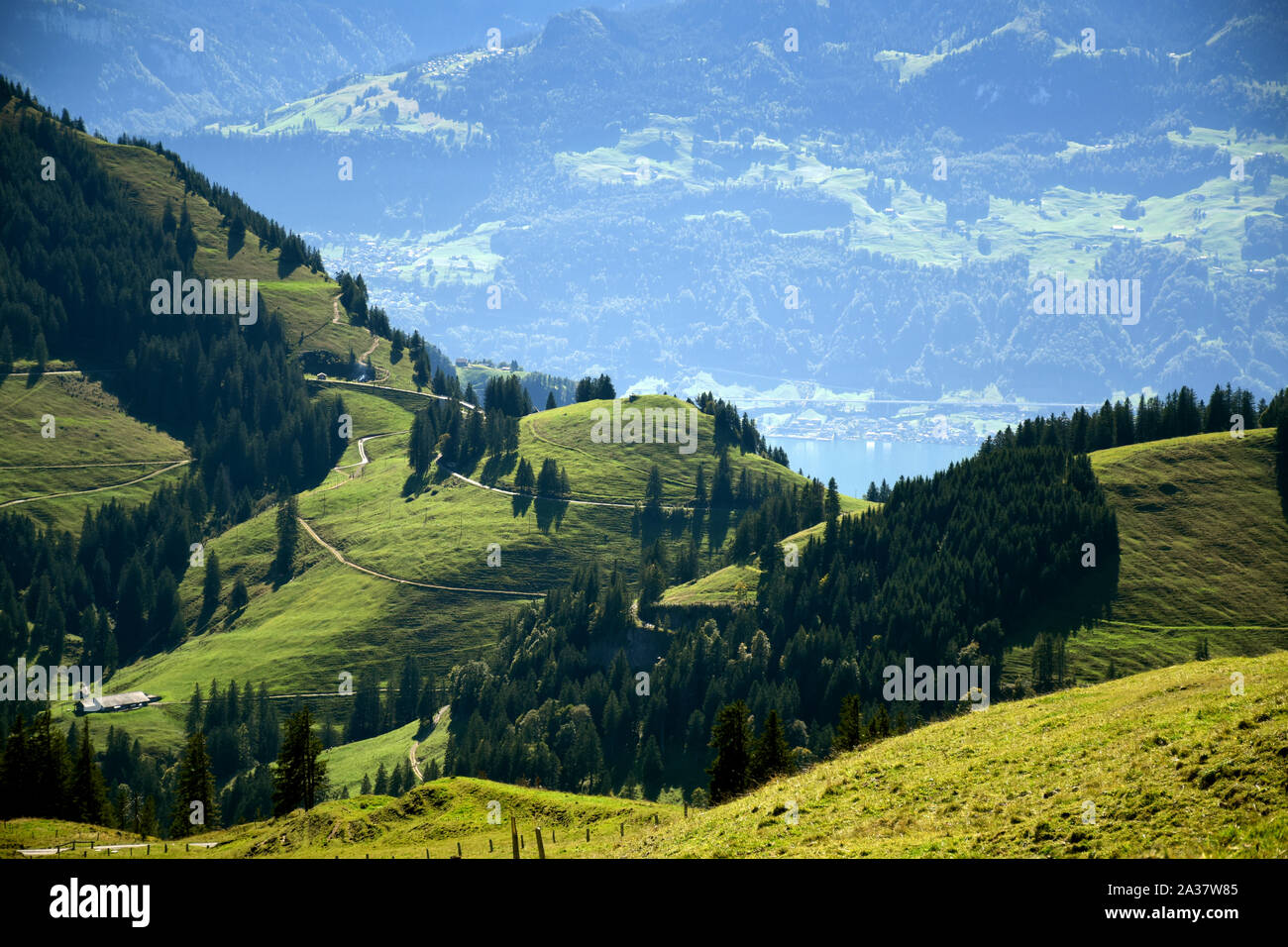 Panoramic landscape view of meadows, mountain ranges and valleys from ...