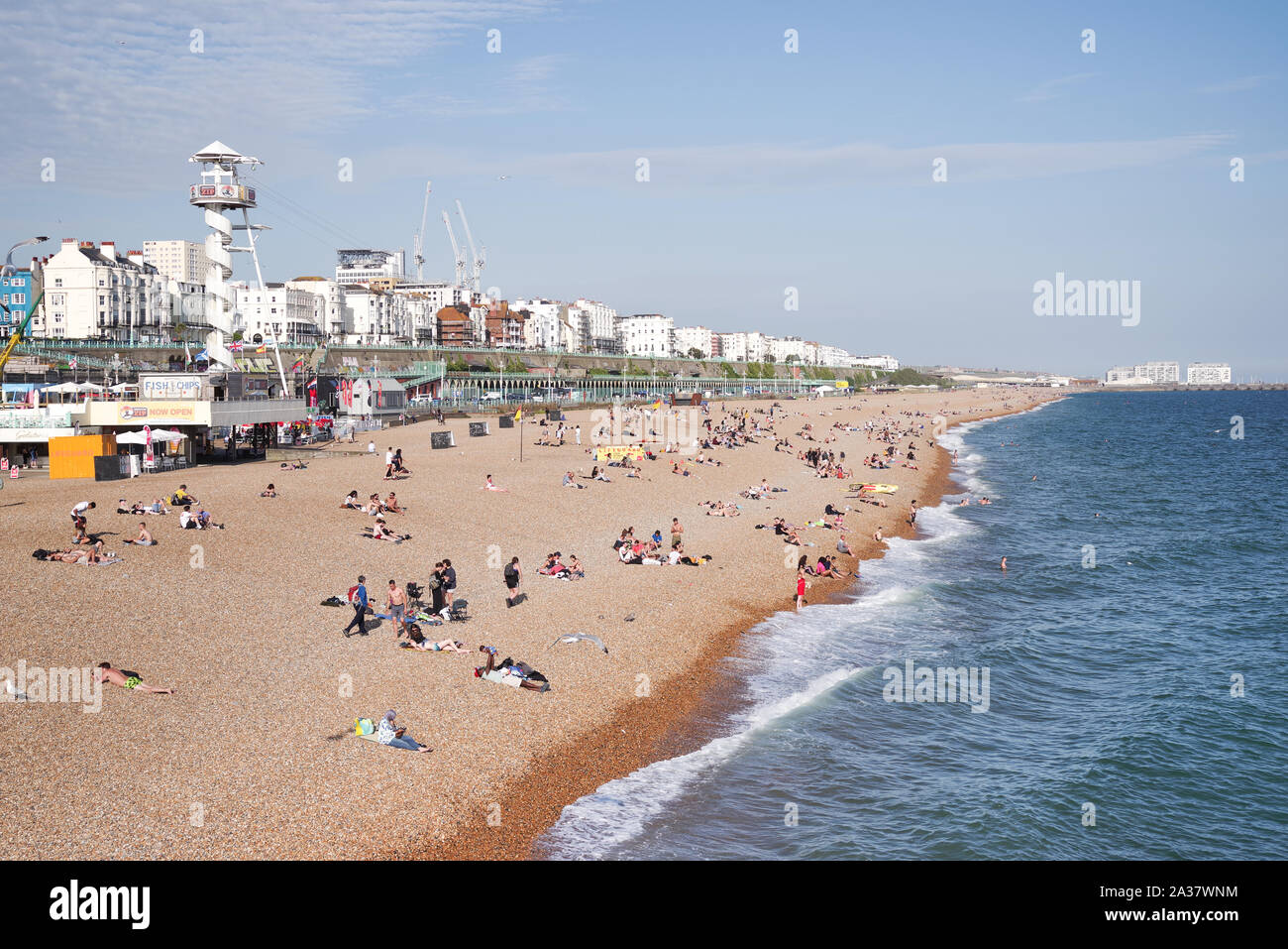 Brighton beach and seafront on a bright, sunny afternoon (East Sussex ...