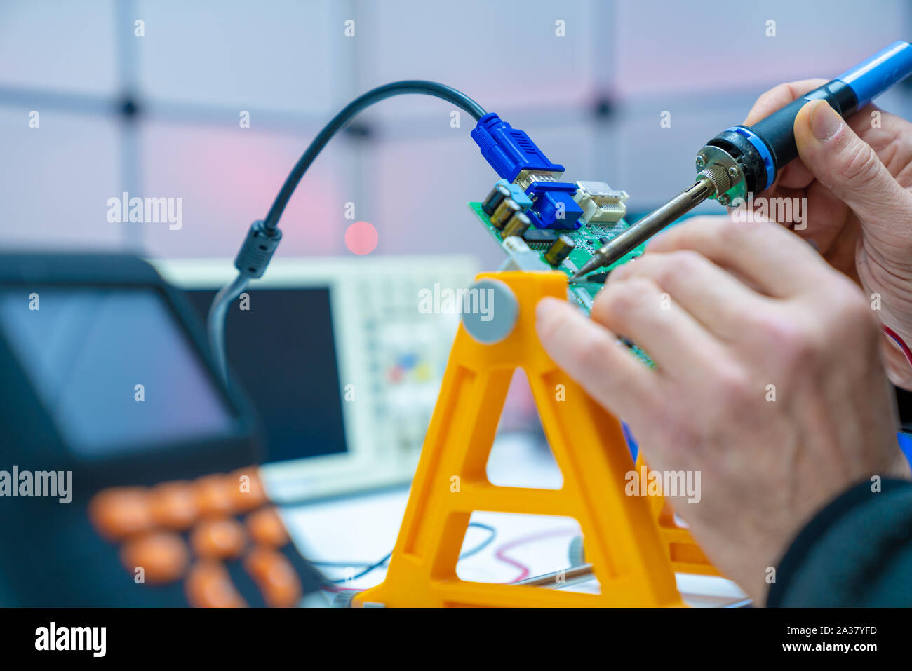 Fixing electronics PCB board in service / workbench with electronics ...