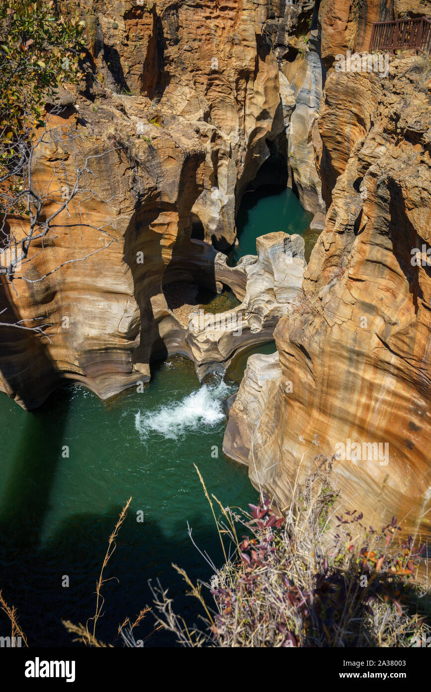 steep walls of red sandstone at bourkes luck potholes, mpumalanga ...