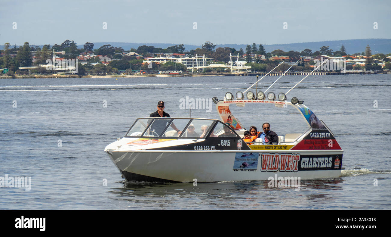 Tourists on a charter boat on the Swan River Perth Western Australia ...