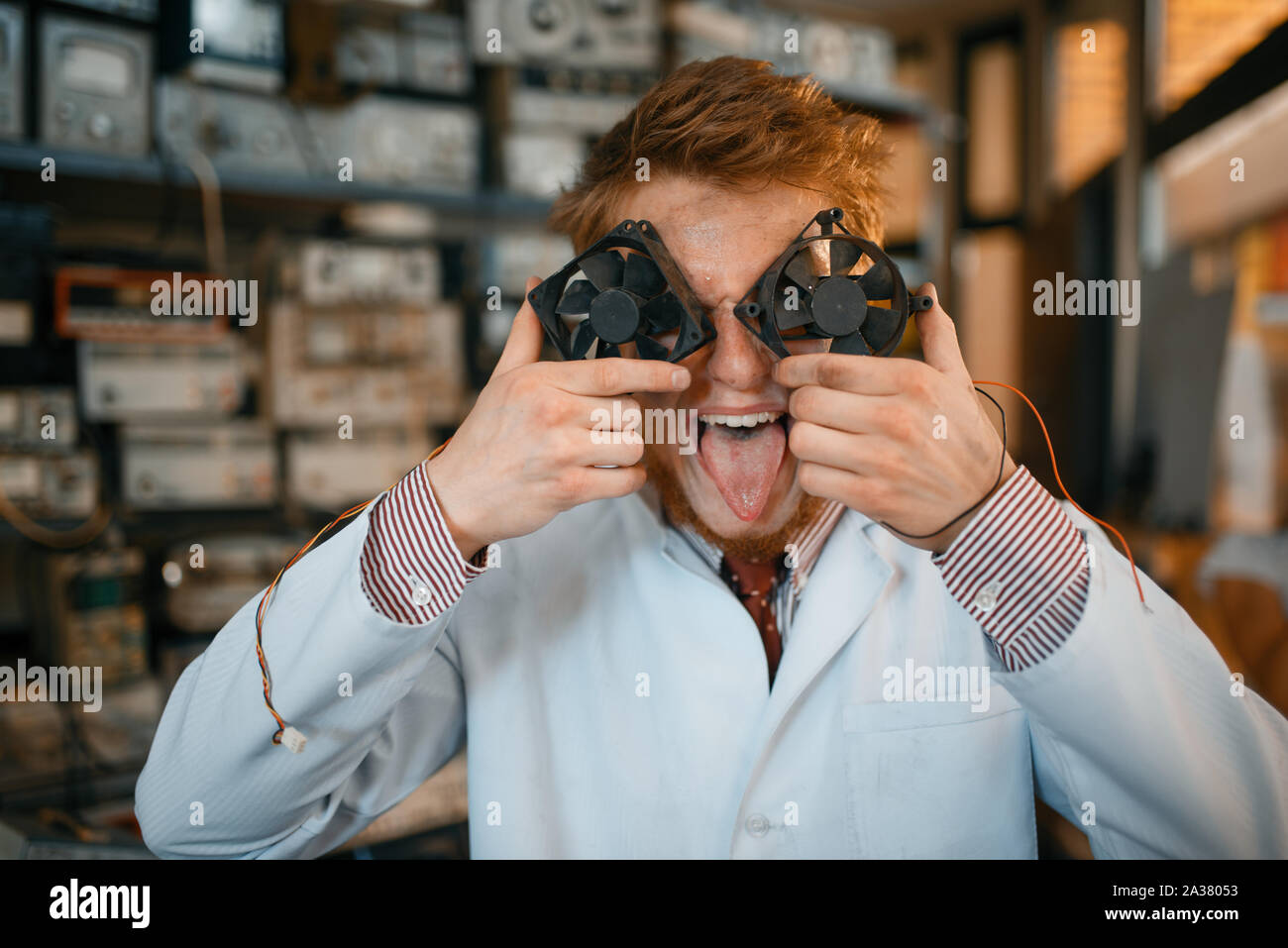 Scientist with fans instead of eyes in laboratory Stock Photo - Alamy