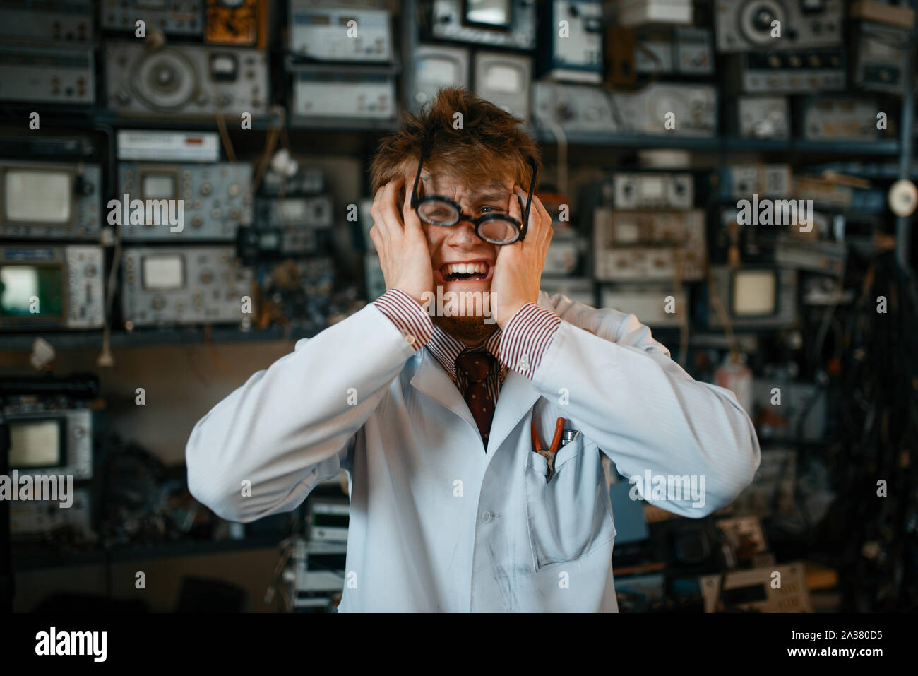 Strange scientist has gone mad in his laboratory Stock Photo - Alamy