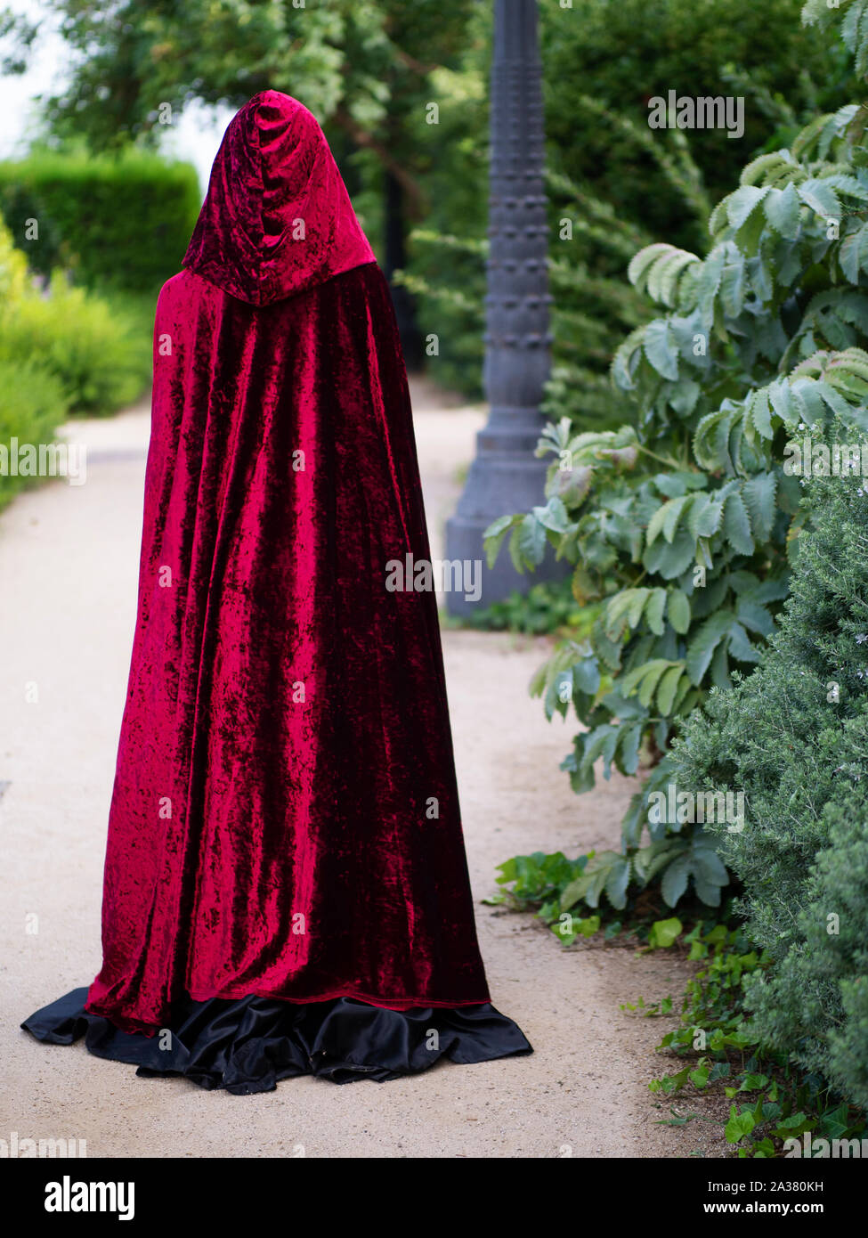 Woman cloak rear view hi-res stock photography and images - Alamy