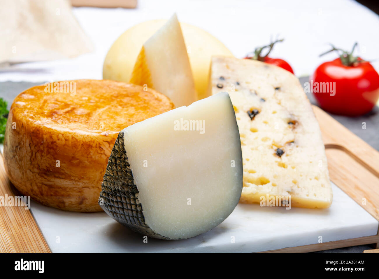 Cheese collection, Variety of Italian pecorino cheeses, aged with black ...