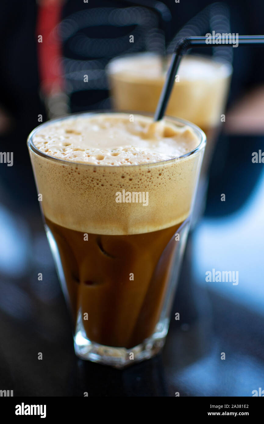 Traditional greek cold coffee Frappe with foam made from water, instant ...