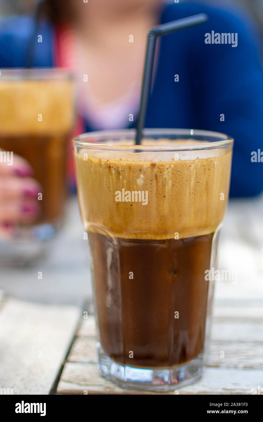 Traditional greek cold coffee Frappe with foam made from water, instant ...
