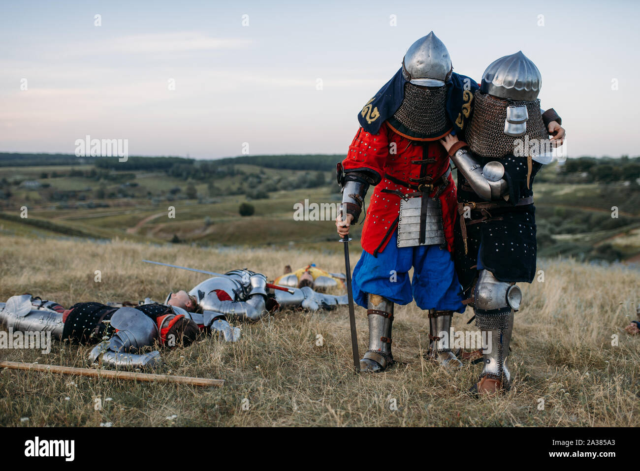 Wounded medieval knights after great battle Stock Photo - Alamy